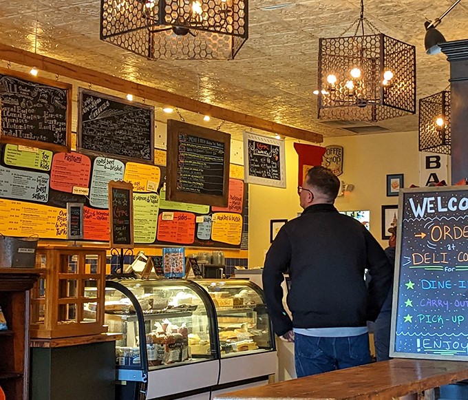 The moment of decision: a customer contemplates the wall of possibilities. Like choosing your favorite child, only with more pastrami options.