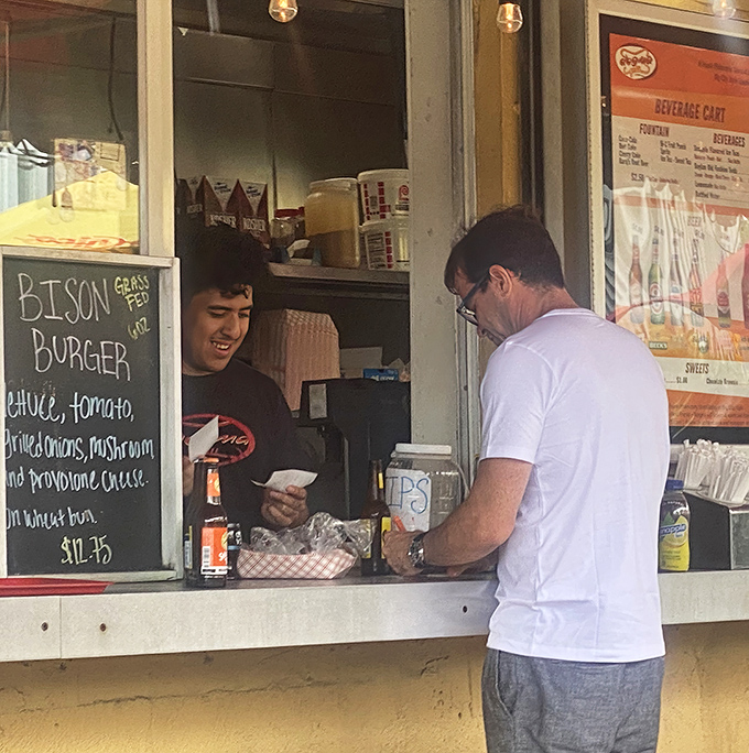 The exchange of cash for culinary happiness—a transaction as old as time. Dogma's friendly service is part of what keeps locals coming back.