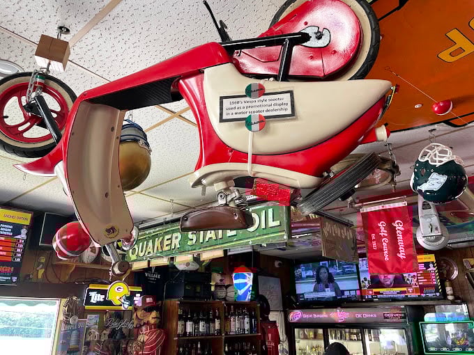 Look up and you'll spot treasures from another era – including that vintage scooter that makes you wonder, "What's the story there?"