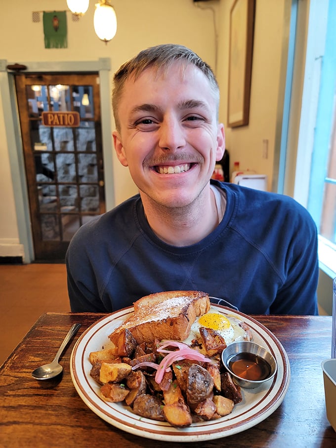 That smile says everything you need to know about The Mont's food—it's the facial expression equivalent of a five-star review.
