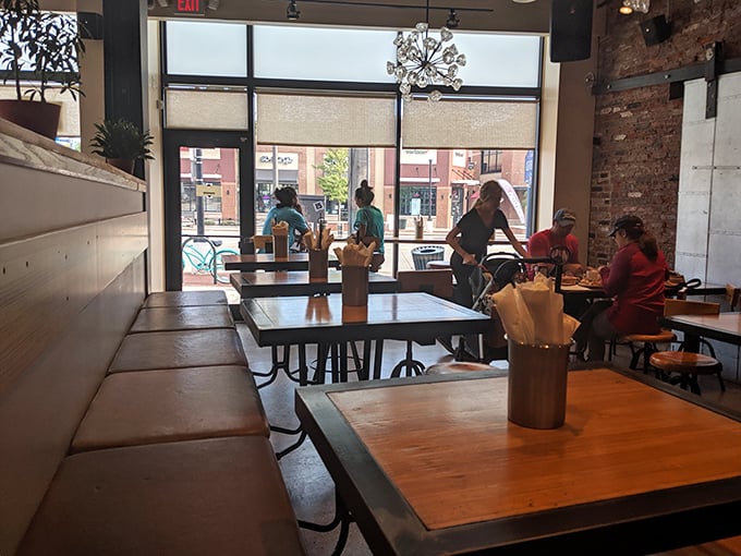 Where locals gather to worship at the altar of properly smoked meats. Notice how nobody's looking at their phones—the food commands full attention.