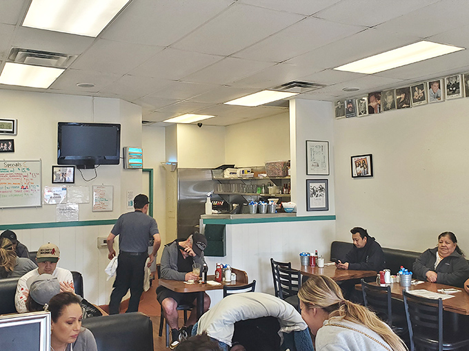 A dining room filled with regulars and first-timers, all united by the universal language of "this food is worth getting out of bed for."