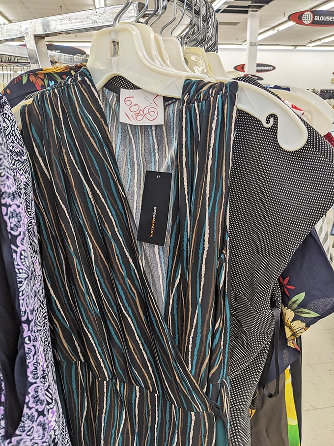 Fashion's greatest hits hang in colorful rows—that striped wrap dress still has its original tags, the thrift equivalent of striking oil.