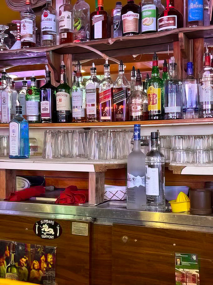 A bar stocked with liquid personality—where your bourbon arrives with a story and your martini comes with a side of local wisdom.