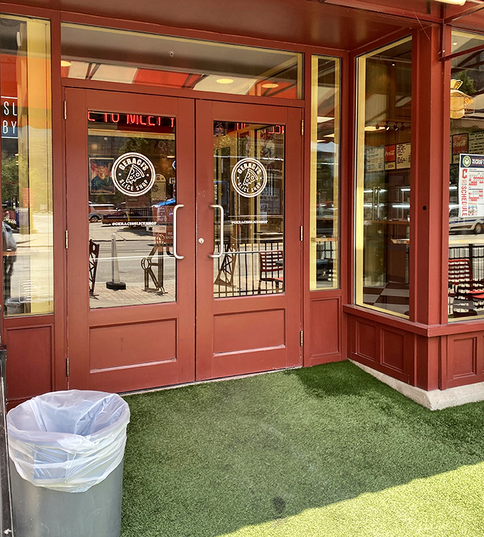 Red doors with the Geraci's logo—like the wardrobe to Narnia, except instead of a lion, you'll find magnificent pizza.