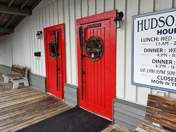 Twin red doors mark the spot where hunger meets happiness – no secret handshake required.