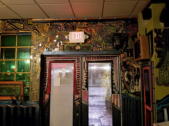 Even the exit is a work of art here. The psychedelic doorway feels like a portal between worlds—one ordinary, one extraordinary.