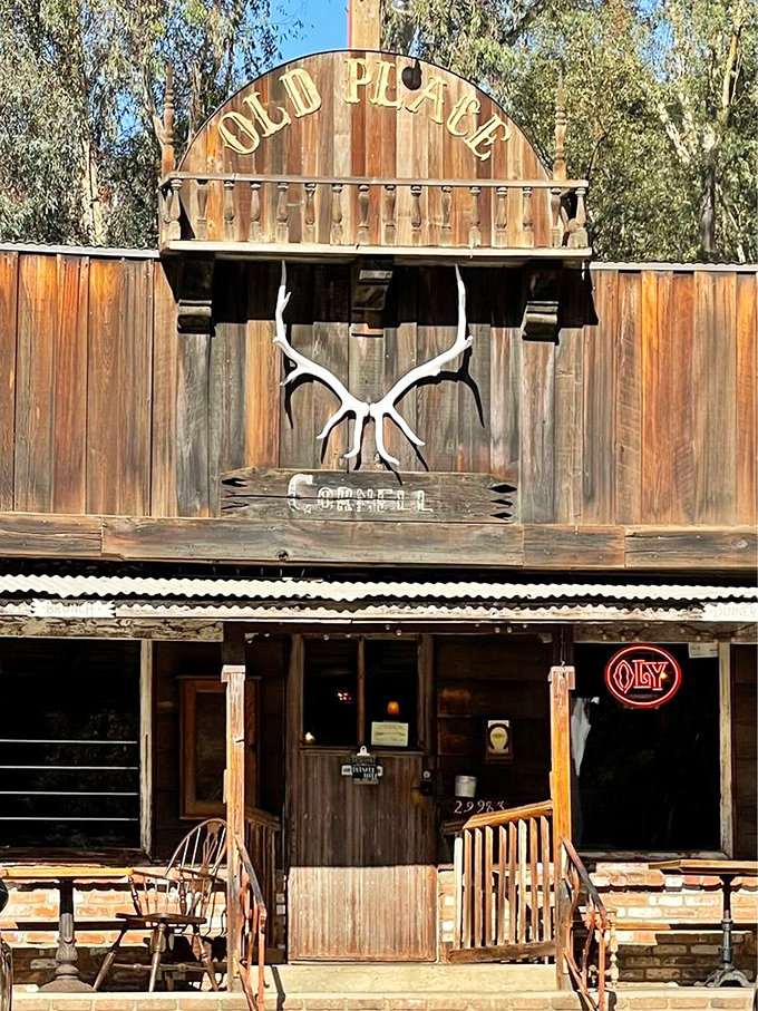 The facade that launched a thousand road trips. Those antlers and weathered wood aren't trying to create a theme—they're simply continuing a tradition that began decades ago.