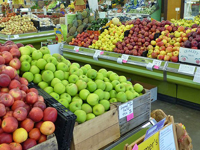Apple varieties your grandmother would recognize, displayed like nature's own rainbow of flavors.