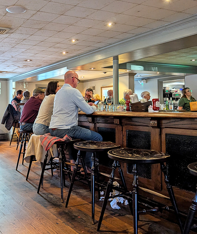 The bar at Buckley's—where strangers become friends and friends become regulars over perfectly poured drinks and local gossip.