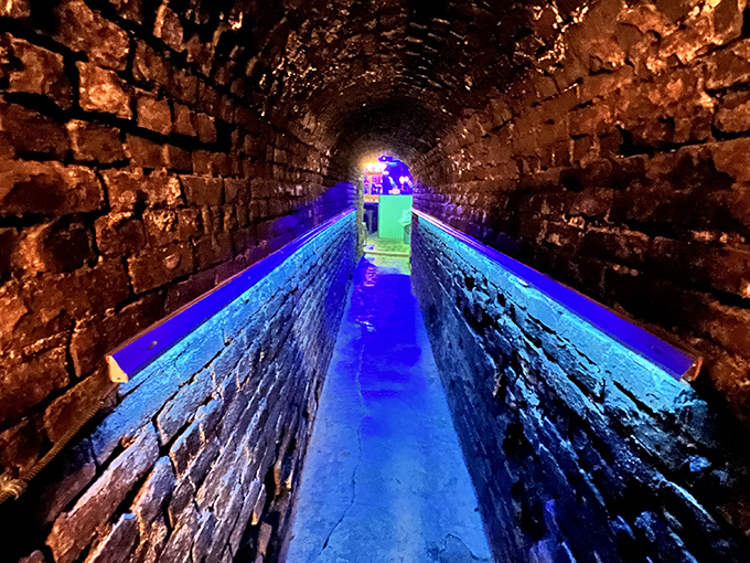 Not just a hallway—a time tunnel carved through limestone, leading adventurous souls deeper into Missouri's most atmospheric drinking den.