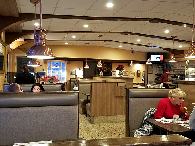 Modern booths meet classic diner service—the perfect setting for making Tuesday morning feel like Saturday brunch.