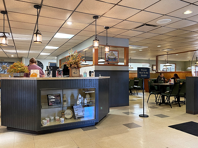 The host station welcomes you like an old friend, while the pendant lights cast just enough glow to make everyone look like they're in a good mood.
