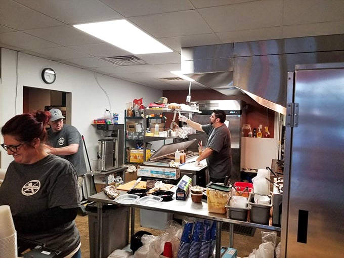 Behind the scenes where the magic happens—a glimpse into the organized chaos of a kitchen dedicated to the slow art of great BBQ.