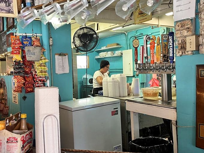 The kitchen setup might be simple, but magic doesn't require fancy equipment—just dedication and a well-seasoned grill.