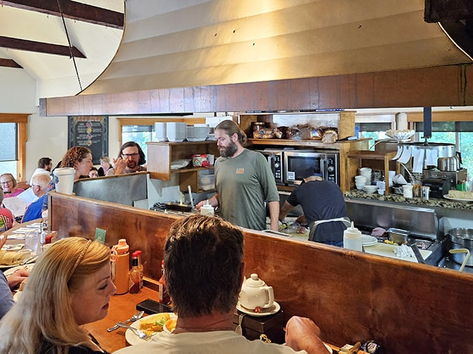 An open kitchen where breakfast magic happens. No smoke and mirrors—just skilled hands turning simple ingredients into morning masterpieces.