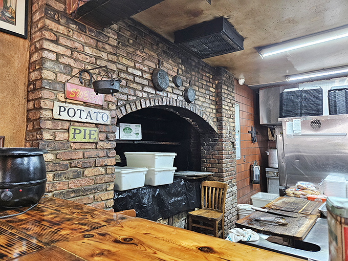 The brick hearth—a barbecue altar where smoke and time transform the ordinary into the extraordinary. This is where the magic happens.
