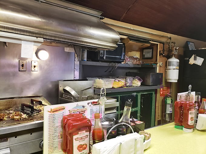Behind the scenes magic happens here, where spatulas dance and eggs transform from humble ingredients to breakfast masterpieces.