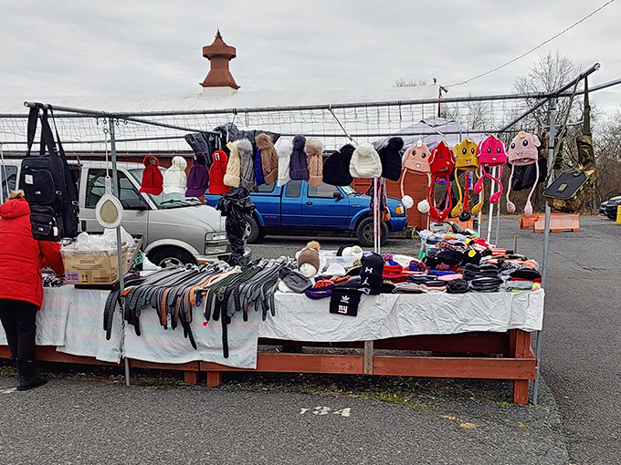 A rainbow of knitted hats dangles like colorful stalactites. In Pennsylvania winters, practical fashion isn't just smart – it's survival with style.