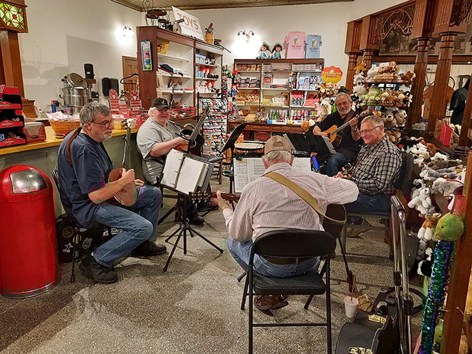 Live music transforms shopping into an event – these impromptu jam sessions between the stuffed animals and candy barrels are pure Tennessee magic.