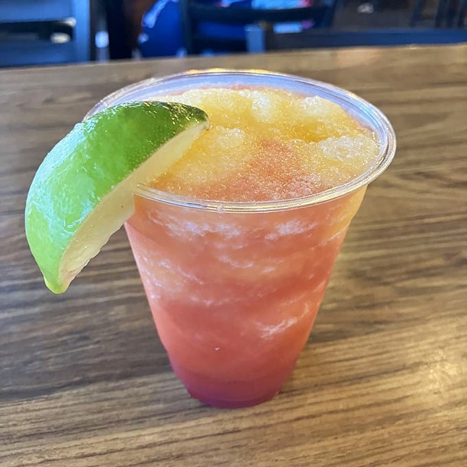 A tropical cocktail that tastes like vacation in a glass – the kind of drink that has you checking real estate prices in Fort Walton Beach.