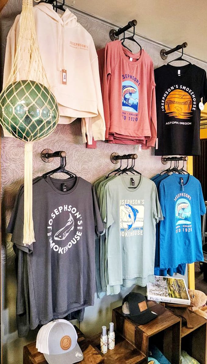 The merch wall – because sometimes you need a t-shirt to prove you made the pilgrimage to one of Oregon's seafood shrines.