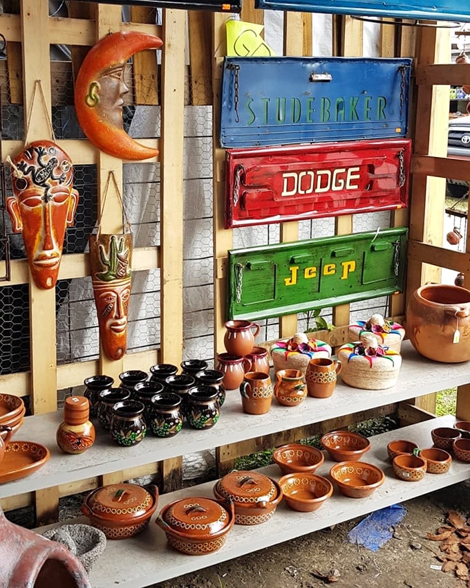 Rustic meets retro with these vintage-inspired metal signs and handcrafted pottery—perfect for that empty wall space crying out for character.