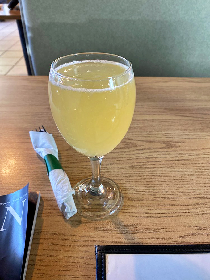 A mimosa catching the light like liquid sunshine—because sometimes breakfast deserves a splash of celebration.