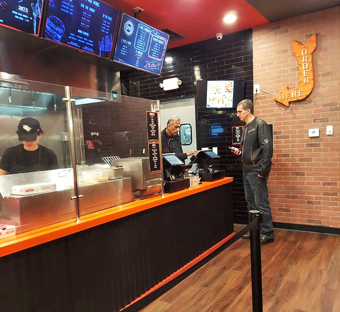 The moment of truth: ordering at the counter. Notice the "ORDER HERE" sign—helpful for those of us distracted by burger possibilities.