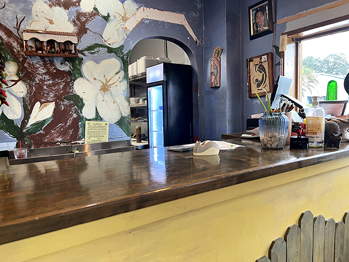 The counter's wooden surface has probably heard more "OMGs" about the food than a teenager's text messages. Those flower murals aren't just pretty—they're witnesses.