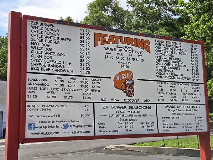 The roadside menu board stands as a monument to straightforward good eating. No QR codes needed for this timeless experience.