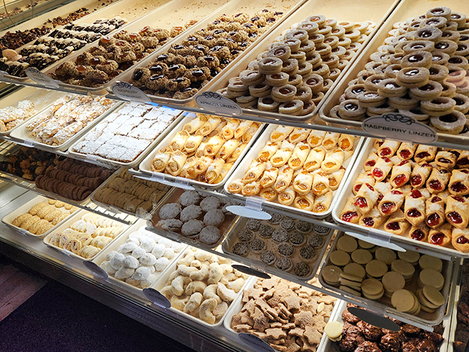 The pastry case at Presti's isn't just a display—it's an art gallery where every piece is edible and no one will judge you for wanting one of each.