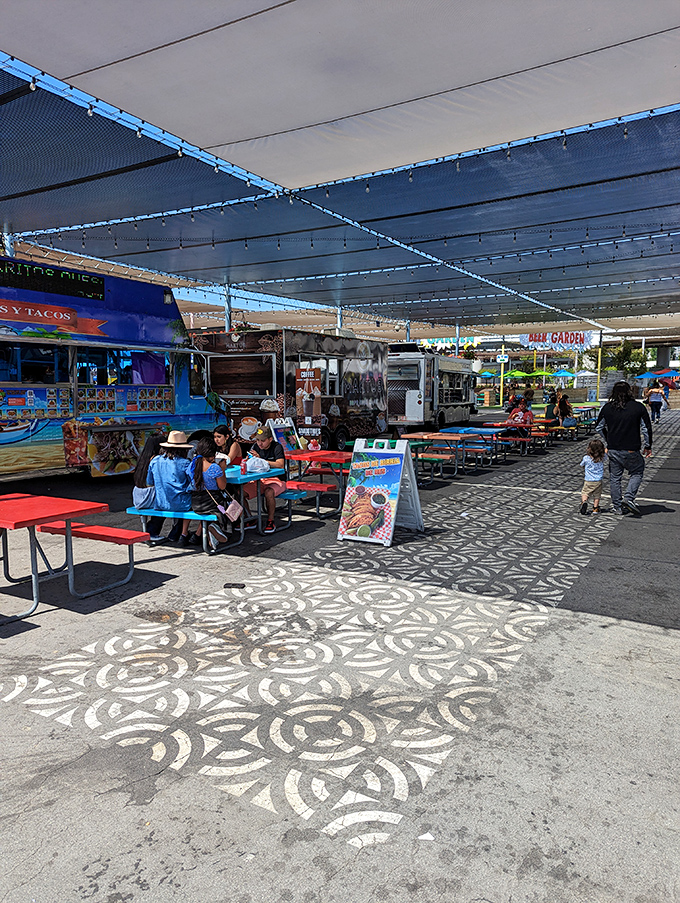 The market's picnic area offers a moment of respite, where hungry shoppers refuel with authentic flavors before diving back into the bargain hunt.