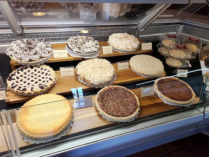 That pie display case holds more temptation than a Vegas casino - but with better odds of satisfaction.