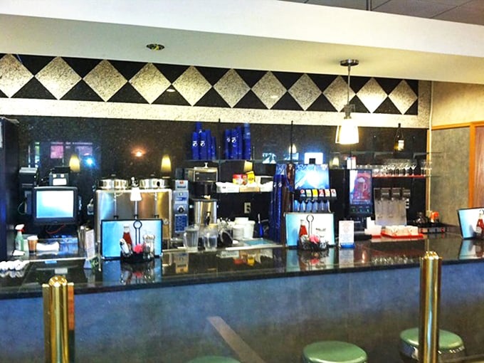 The command center where coffee dreams come true. That black and white diamond border isn't just decoration—it's a diner credential of authenticity.