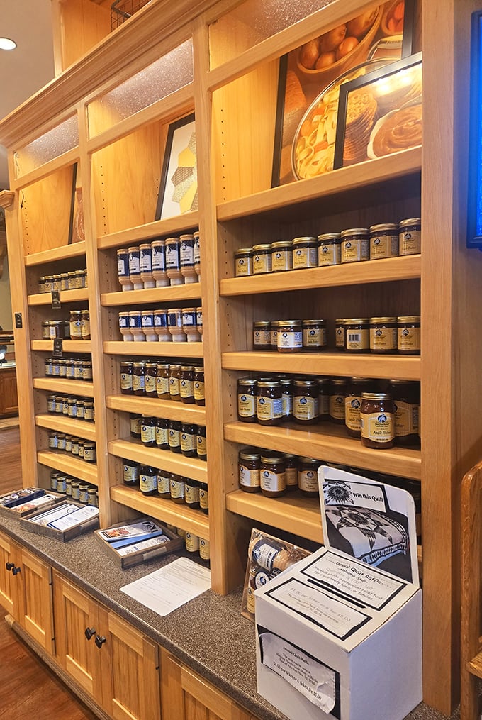The gift shop's shelves hold jars of possibility—each preserve and spread capturing summer's bounty for your pantry.