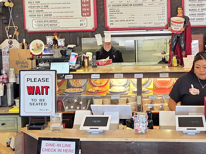 "Please Wait To Be Seated" isn't just a sign—it's a promise that good things come to those who follow the chicken protocol.