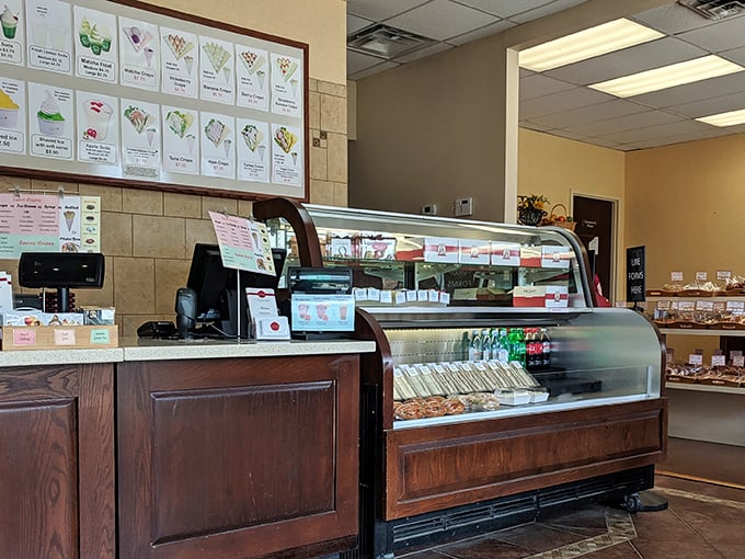 The bakery counter—where dreams and reality meet. Behind that glass lies a world of flavors that will haunt your thoughts for weeks.