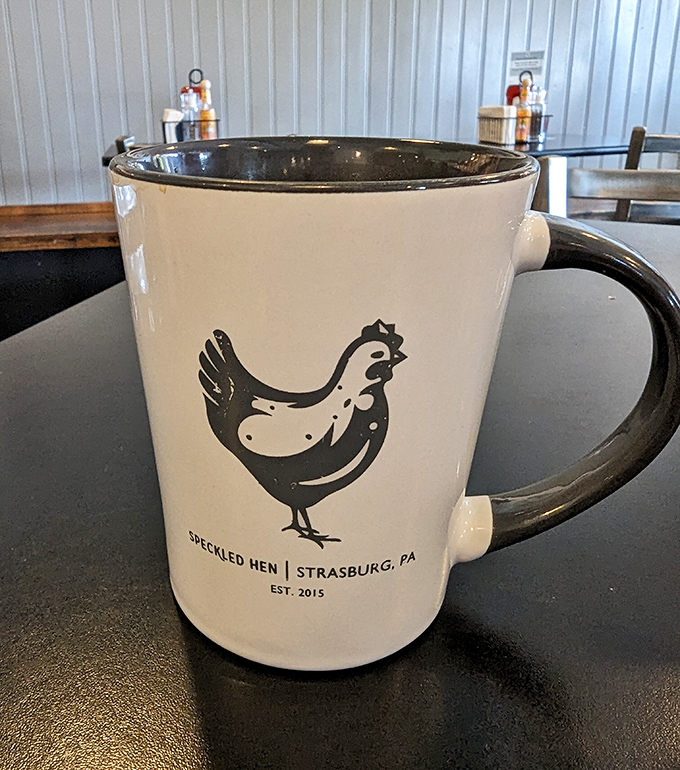 The kind of mug you'll be tempted to slip into your bag – branded with the iconic speckled hen that's become Strasburg's breakfast mascot.