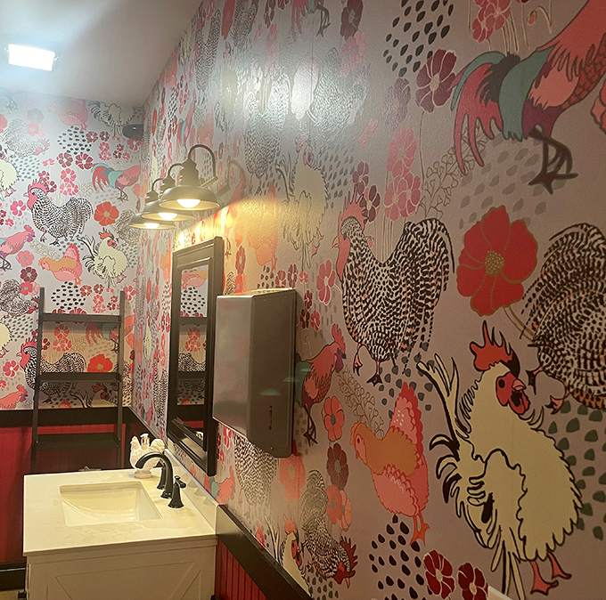 Even the restroom wallpaper tells a story—whimsical chickens and flowers that remind you where those perfect eggs originated.