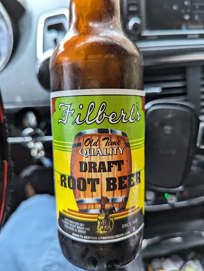 A bottle of Filbert's root beer—the local elixir that cuts through the richness of beef and completes the authentic Chicago experience.