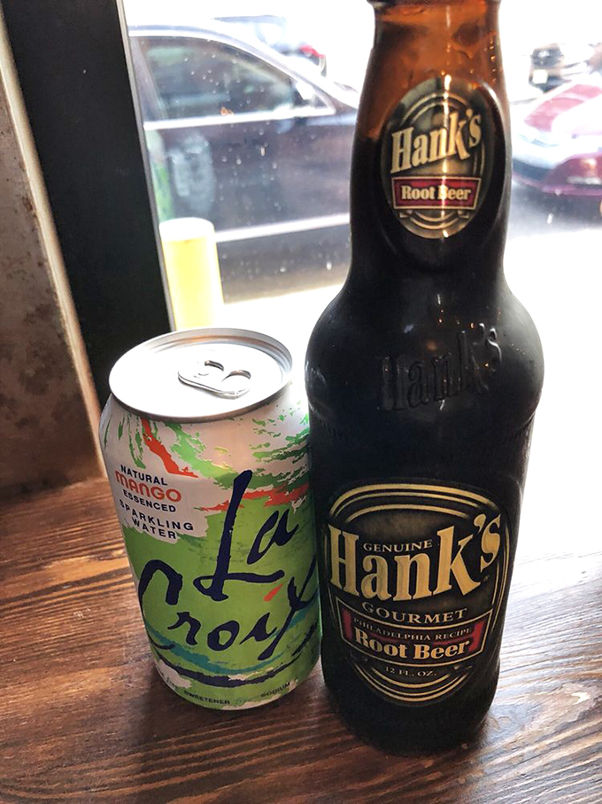 Local beverages including Hank's root beer show this place supports neighborhood businesses while quenching your thirst perfectly.