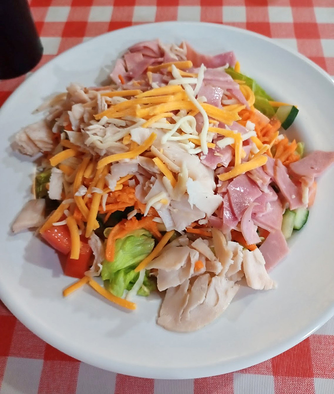 A chef's salad that proves vegetables can hang with the big boys – loaded with enough protein to make a bodybuilder nod in approval.