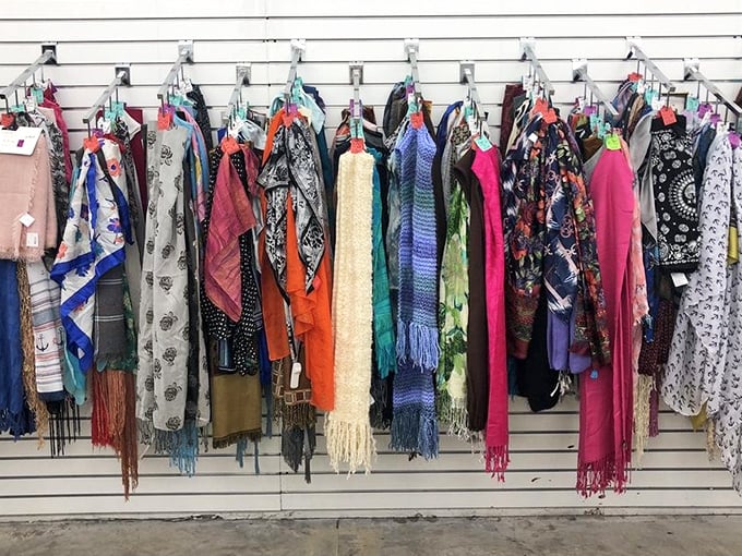 Scarves cascade in colorful abundance, offering instant elegance that transforms any outfit from basic to absolutely fabulous effortlessly.