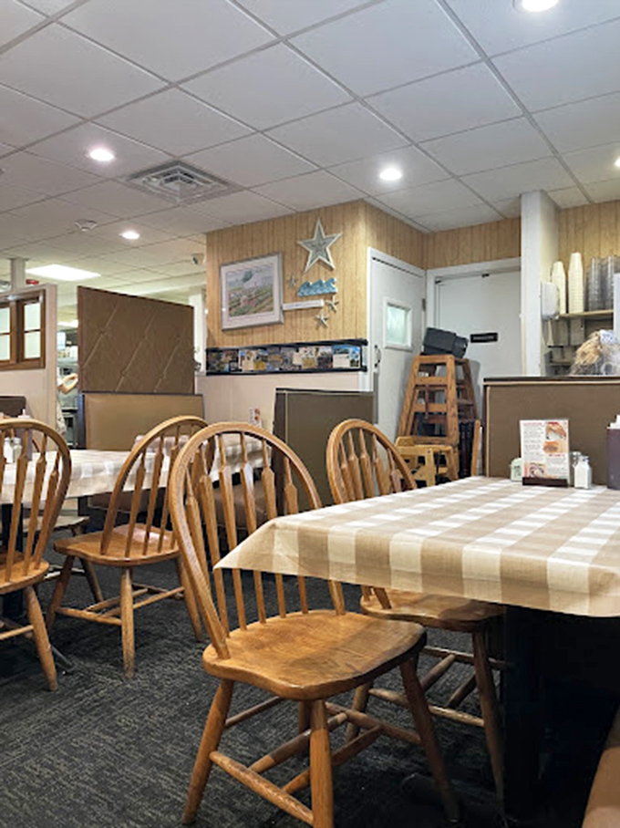 Simple wooden chairs and checkered tablecloths—the stage setting for memories that will outlast the meal itself.