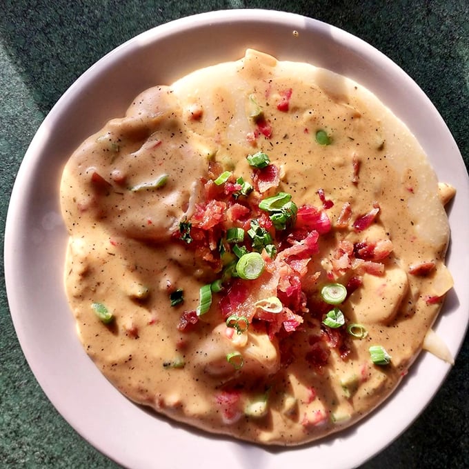 This isn't just shrimp and grits – it's a creamy Southern hug in a bowl, topped with bacon confetti because someone loves you.