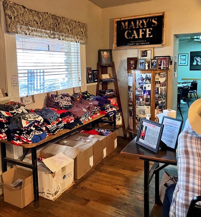 The souvenir corner proves people don't just want to eat at Mary's—they want to take a piece of this Texas legend home with them.