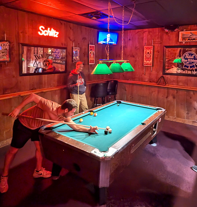 The pool table area proves Hounddog's knows great nights need more than just great food—they need spaces where memories and friendly rivalries are born.