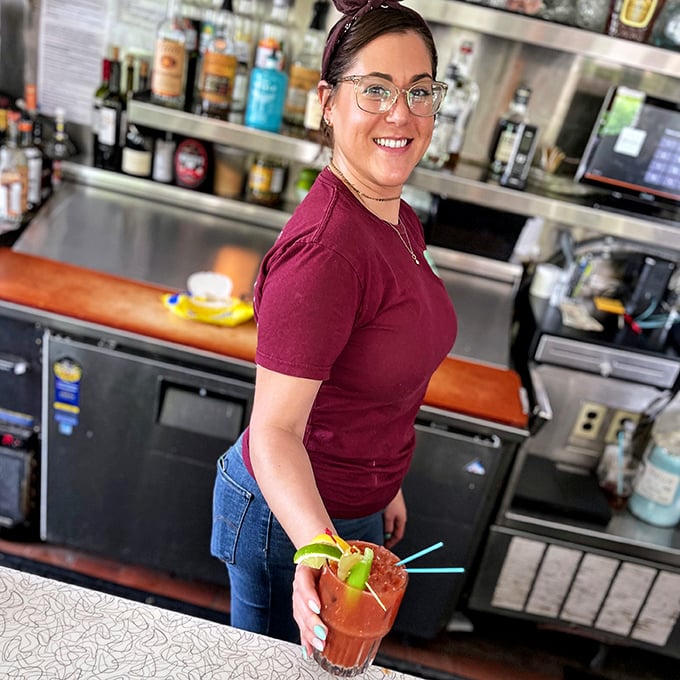 The cocktails here don't just quench your thirst—they arrive with a side of genuine Florida hospitality that no resort bar can replicate.