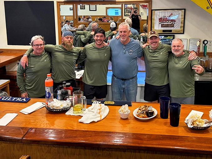 A group of friends enjoying what The Hangout does best—bringing people together over good food in a place where memories are made.